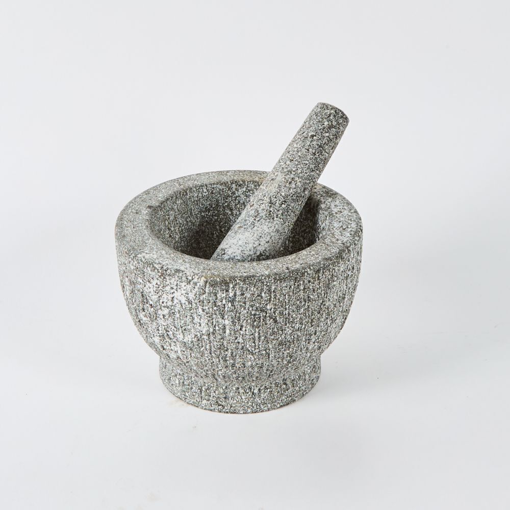 A Heavy Marble Mortar And Pestle
