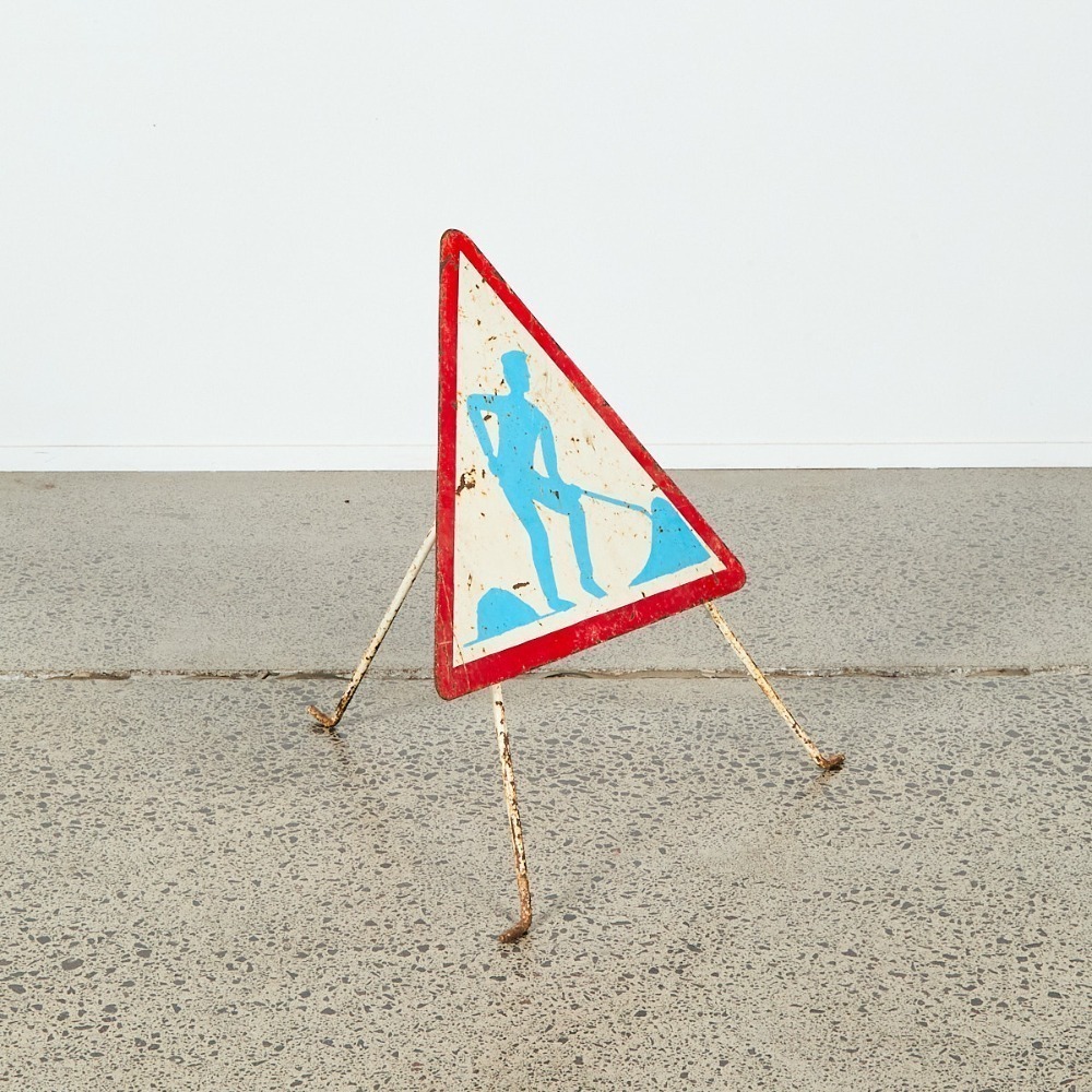 A Vintage French Roadworks Ahead Metal Sign and Stand