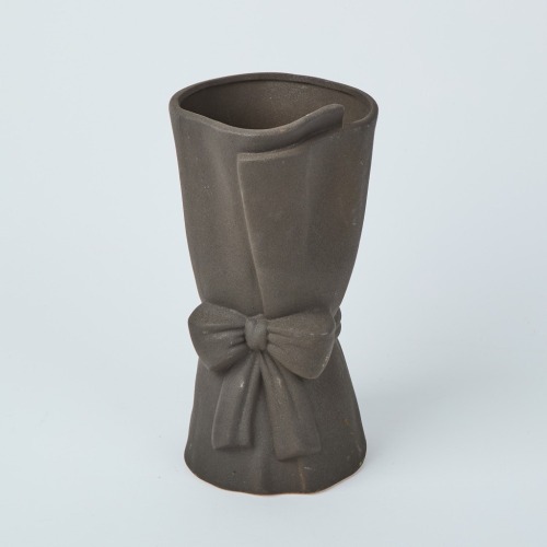 A Le Forge Ceramic Bow Vase with Textured Finish