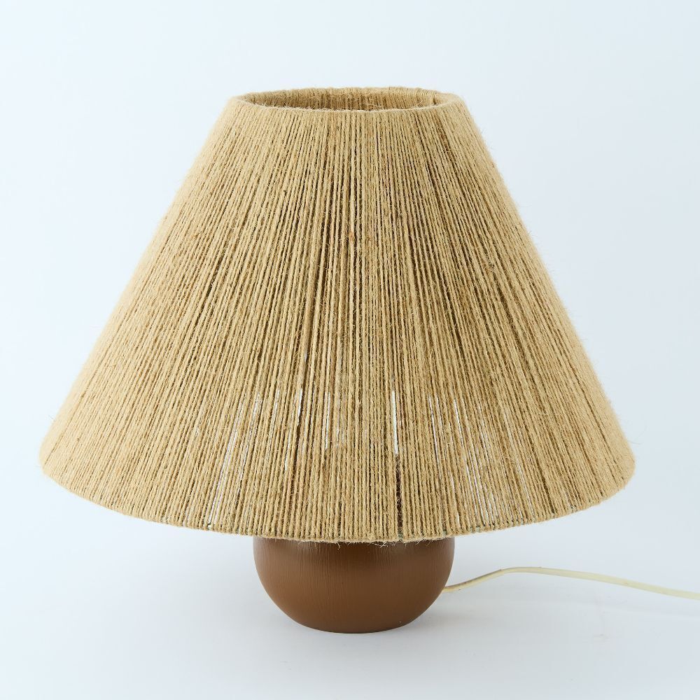 A Rounded Base Lamp with Woven Lamp Shade