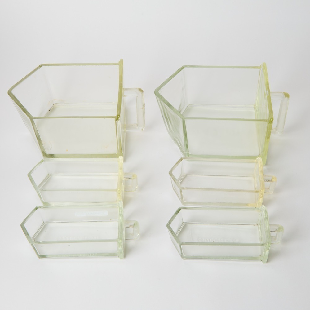 A Set of Vintage Kitchen Glass Chutes