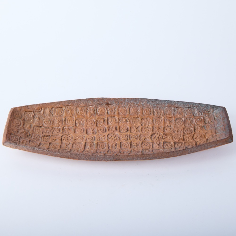 A Doris Dutch Stamped Coffin Dish