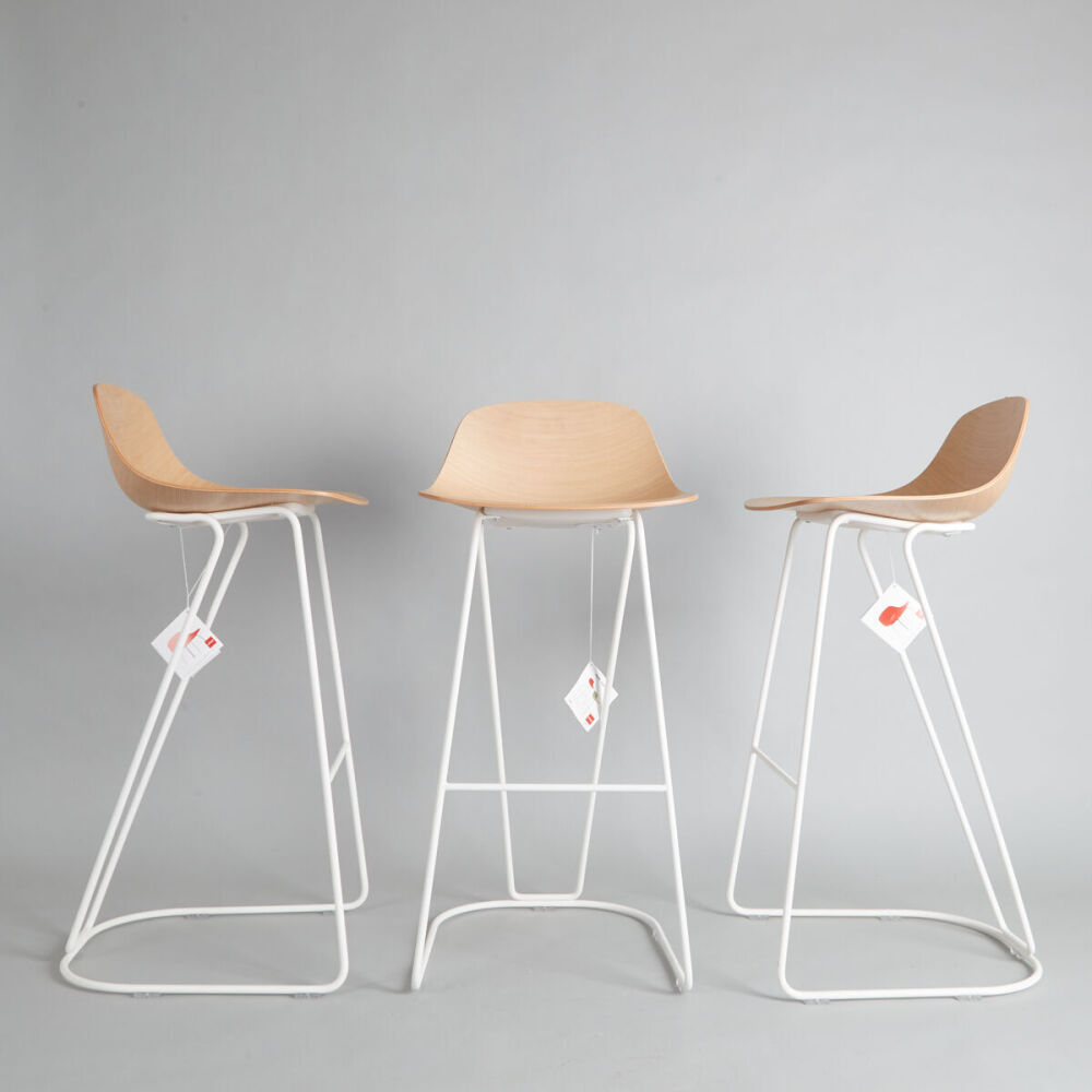 A Set of Three Pure Loop Mini Dandy Bar Stools by Infiniti