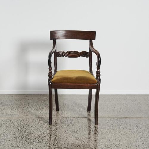 An Antique Scroll Arm Chair