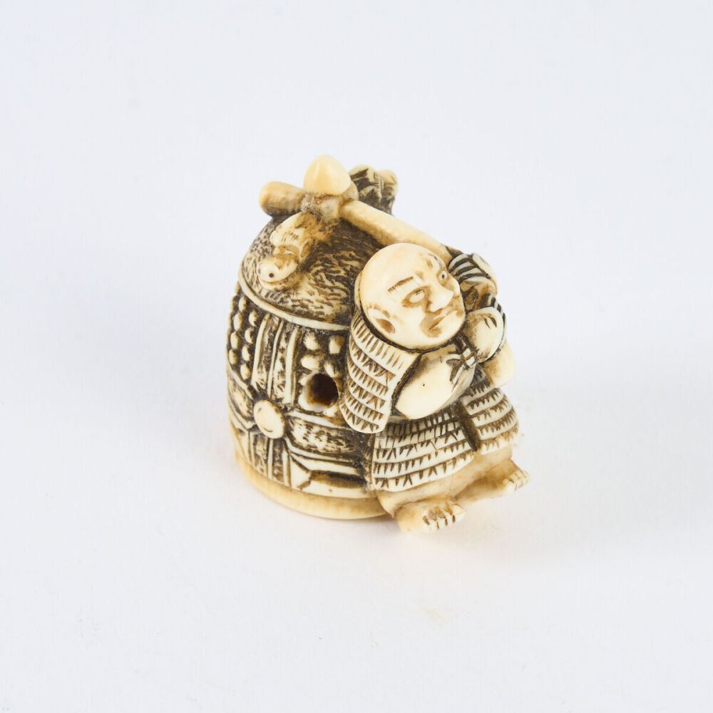 A 19th Century Carved Ivory Netsuke Of Benkei