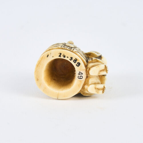 A 19th Century Carved Ivory Netsuke Of Benkei