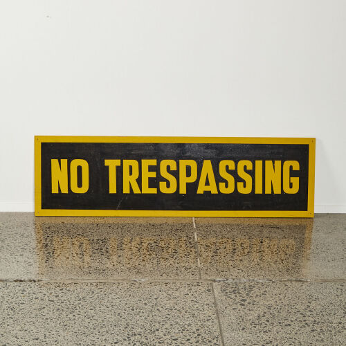 A Hand-Painted No Trespassing Sign