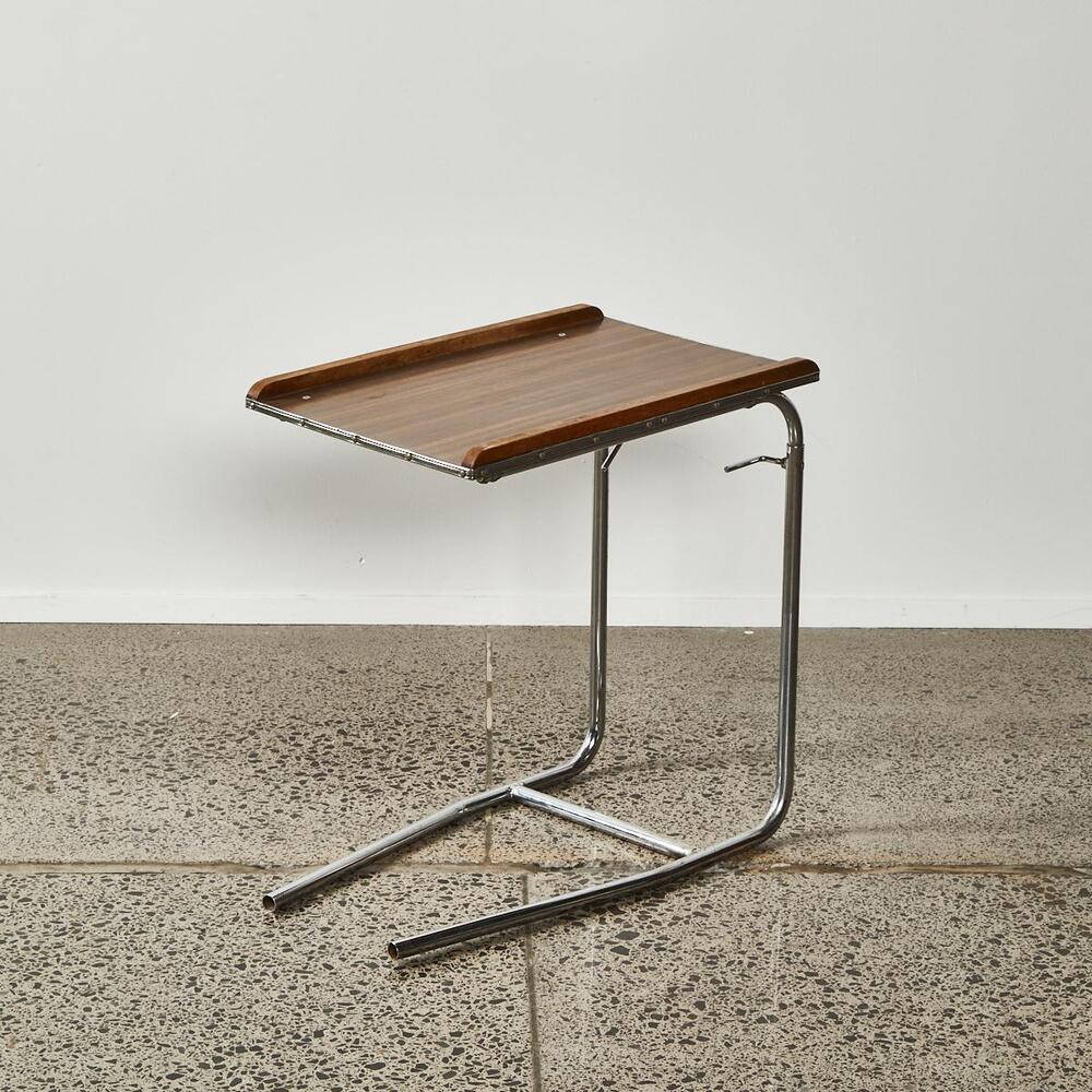 A Mid-Century Adjustable Chrome And Formica Side Table