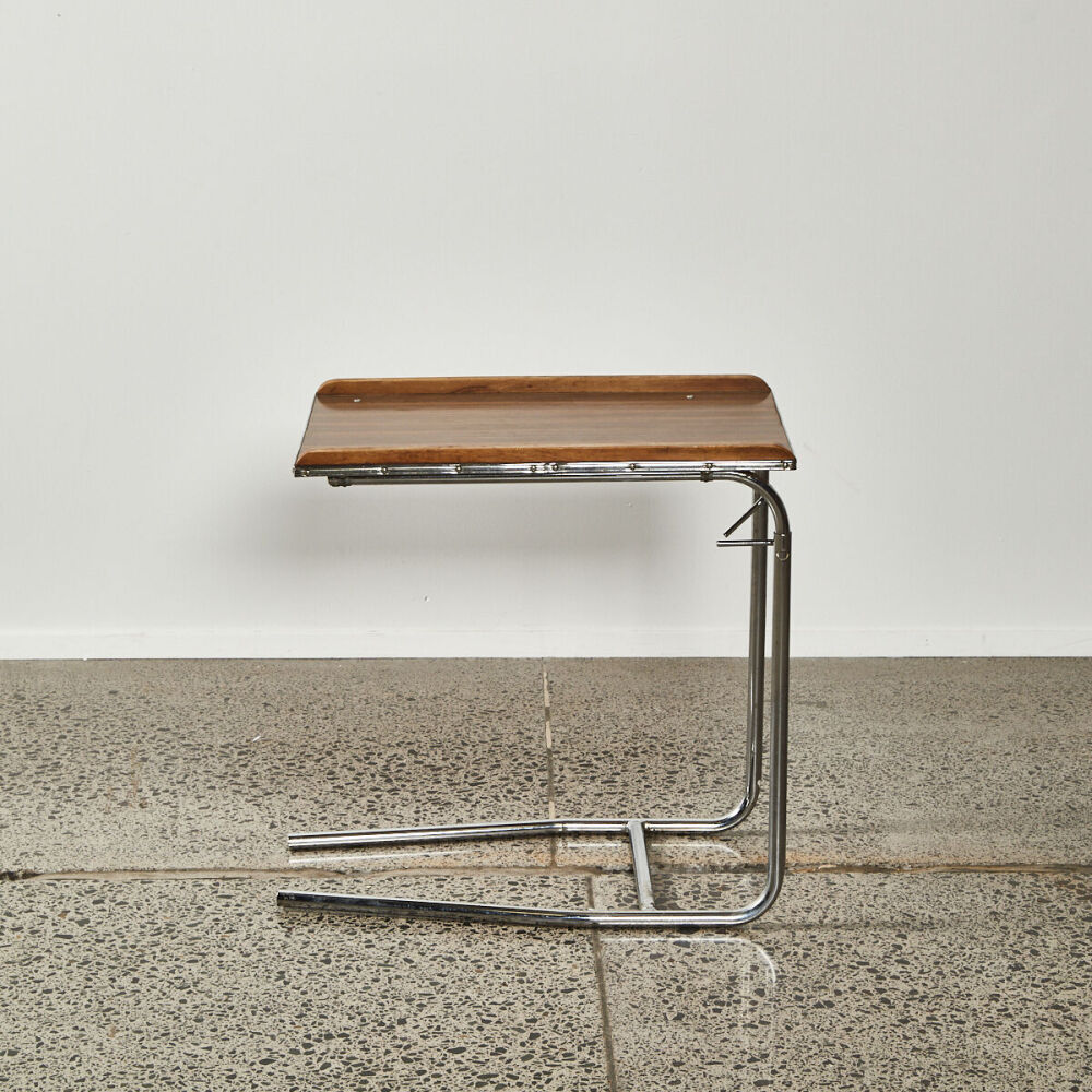 A Mid-Century Adjustable Chrome And Formica Side Table