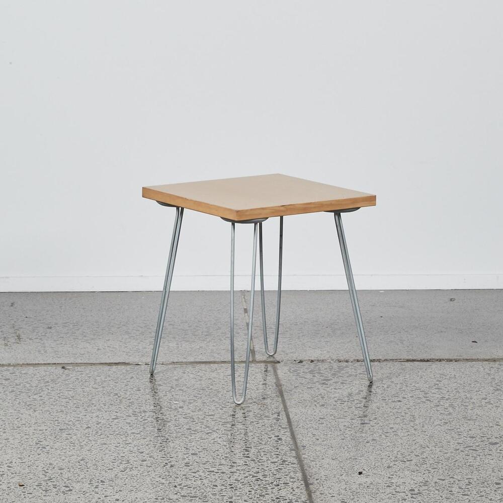 A Contemporary Side Table With Hair Pin Legs