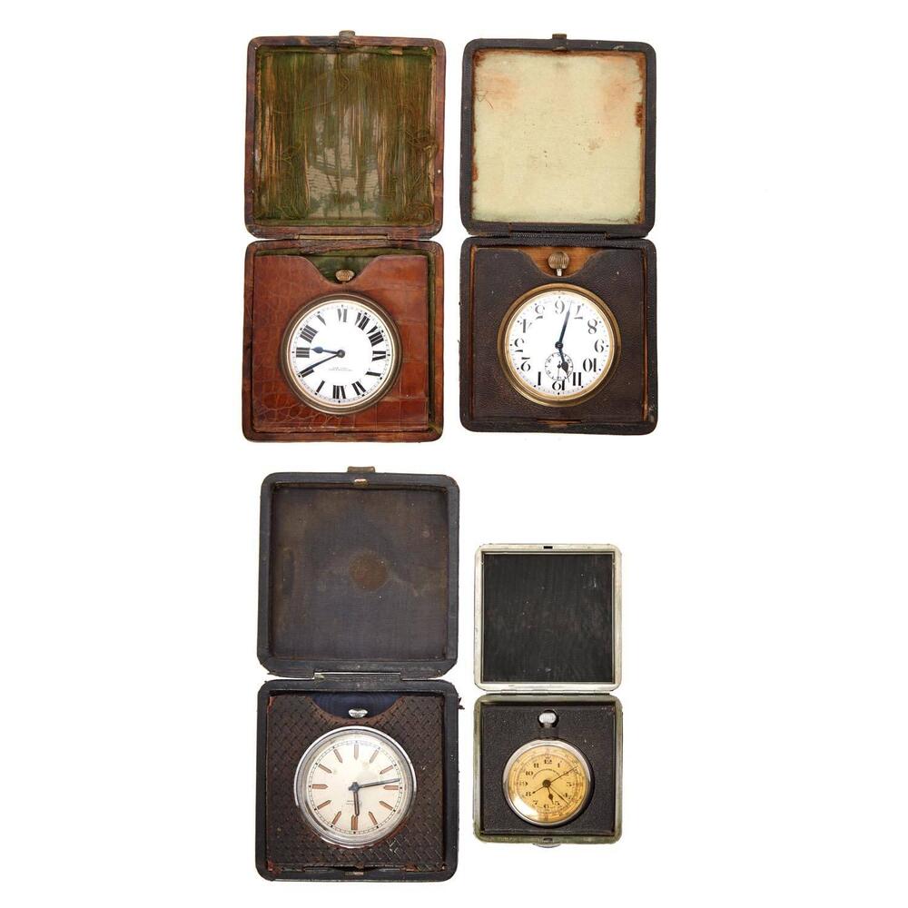 Four Vintage Swiss 1920s Leather Cased Travelling Clocks