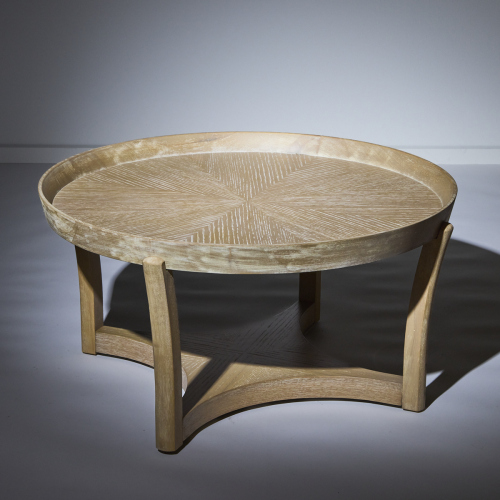 An Affinity Round Cocktail Table by SR Interiors