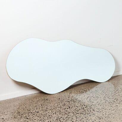 An MCM Wall Mounted Wiggle Mirror