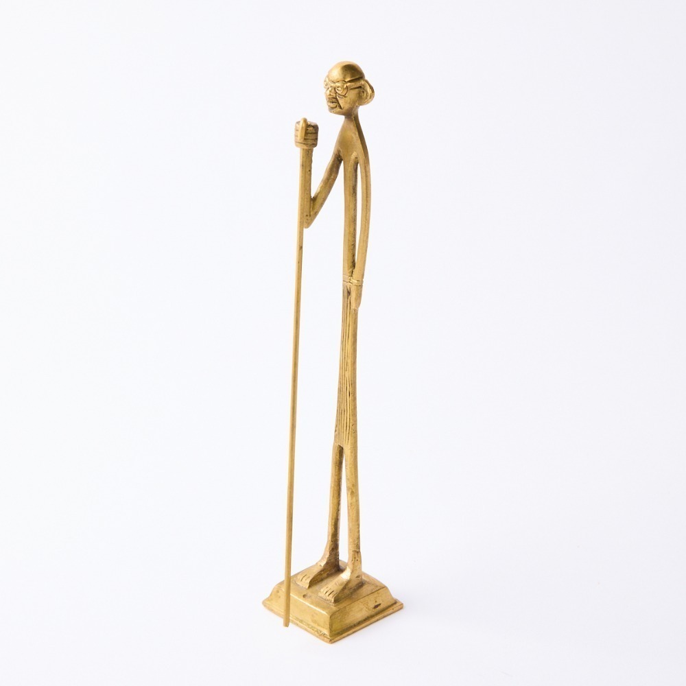 An Elongated Brass Gandhi Statue