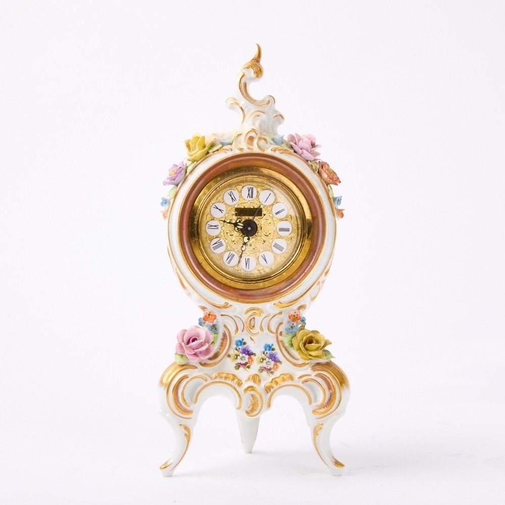 A Dresden West-German Clock with Porcelain Face