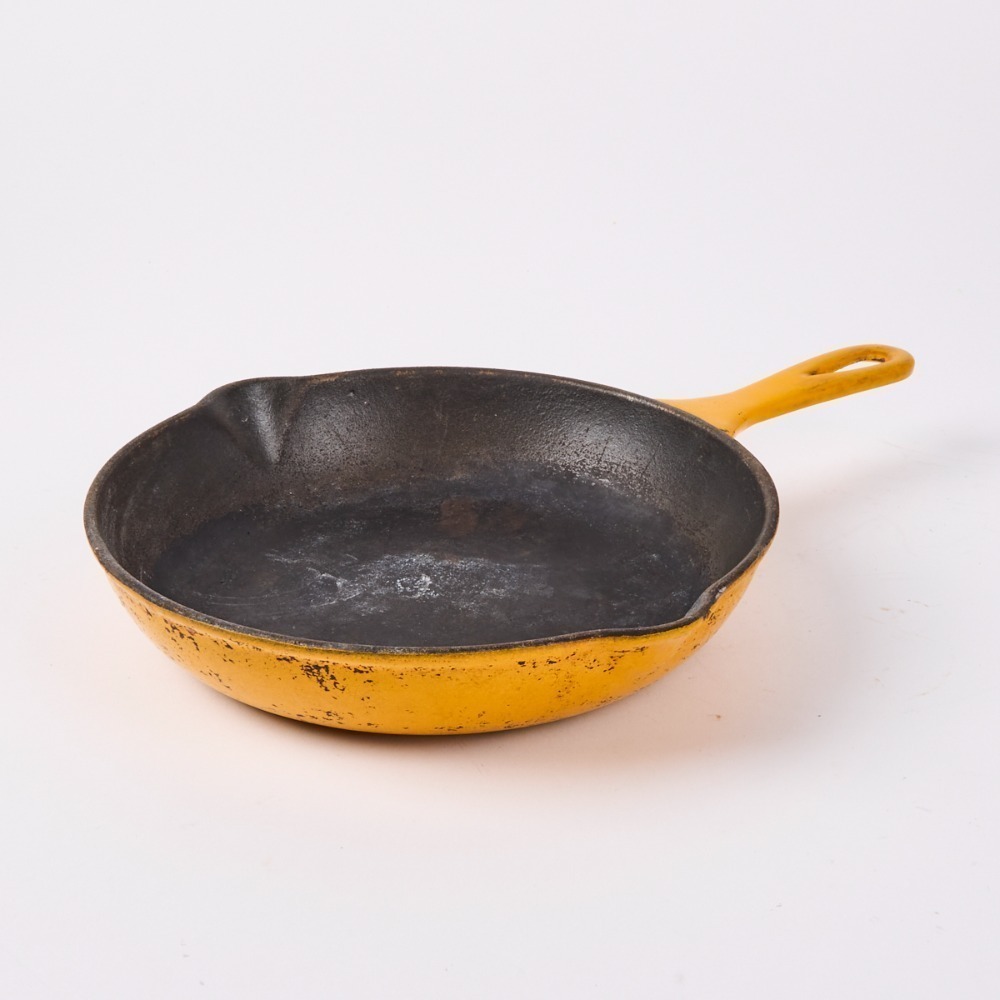 A Le Creuset Yellow Cast Iron Frying Pan