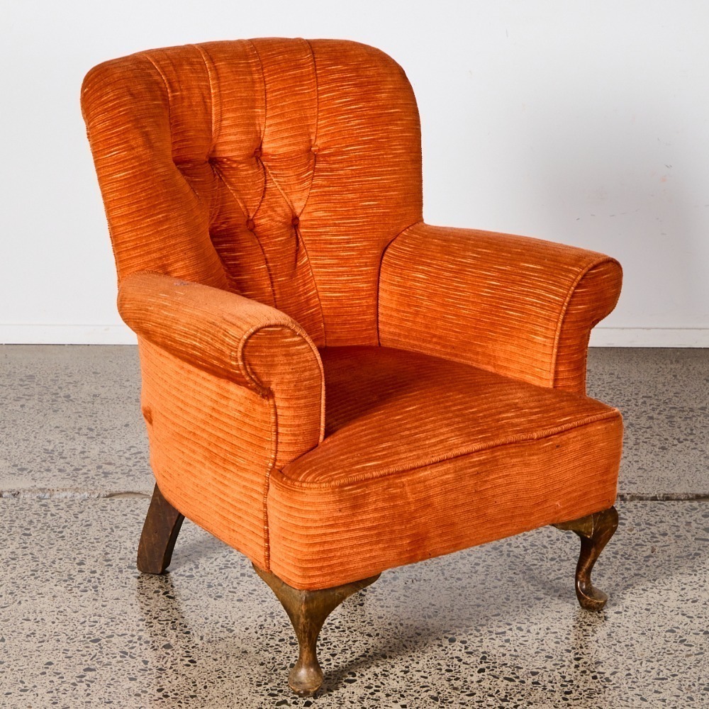A Single Library Chair In Original Orange Upholstery