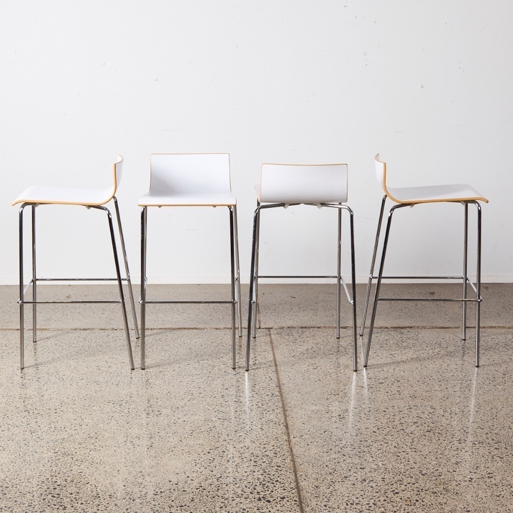 A Suite of Four Minimal Bar Stools With Stainless Steel Base