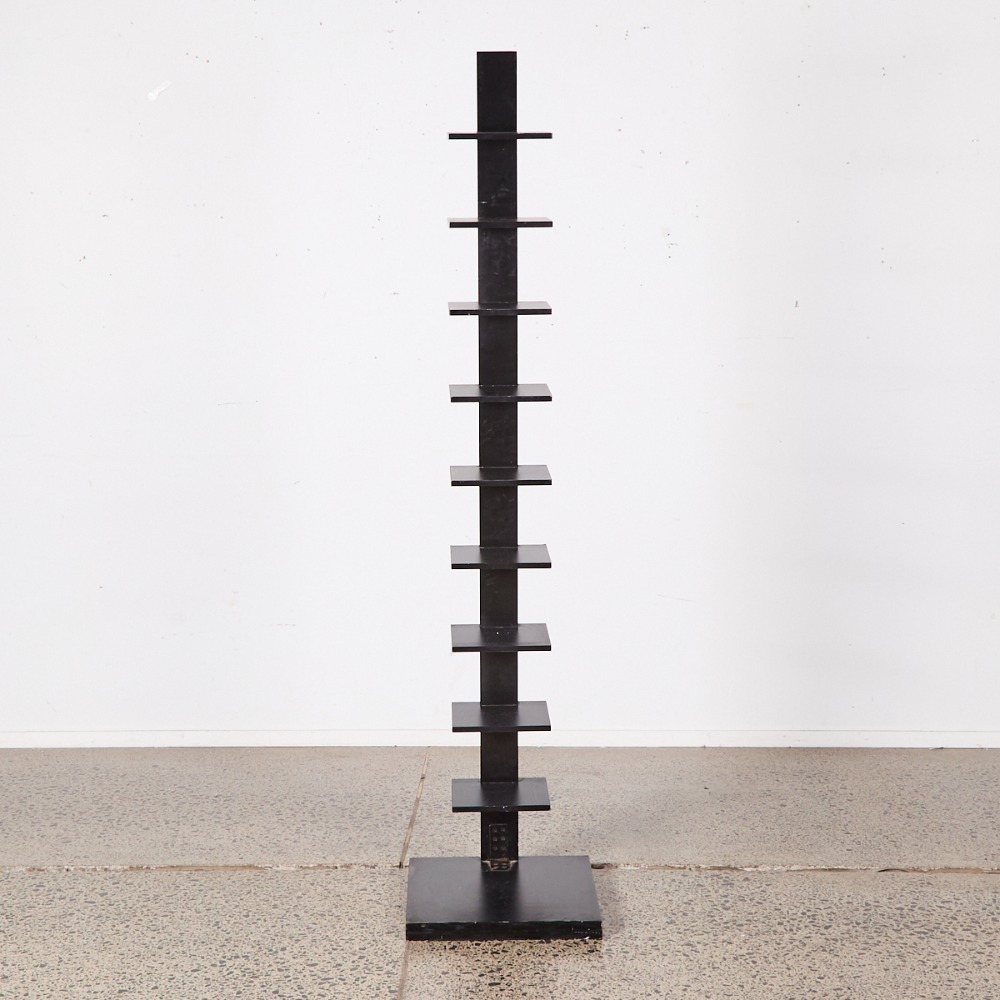 A Black Wooden Vertical Book Shelf