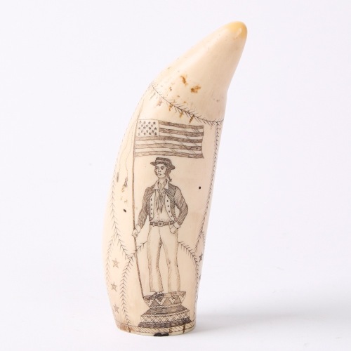 A Resin Replica Scrimshaw Whale's Tooth
