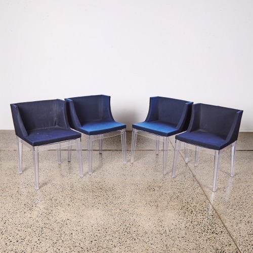 A Set of Four Kartell Style Chairs