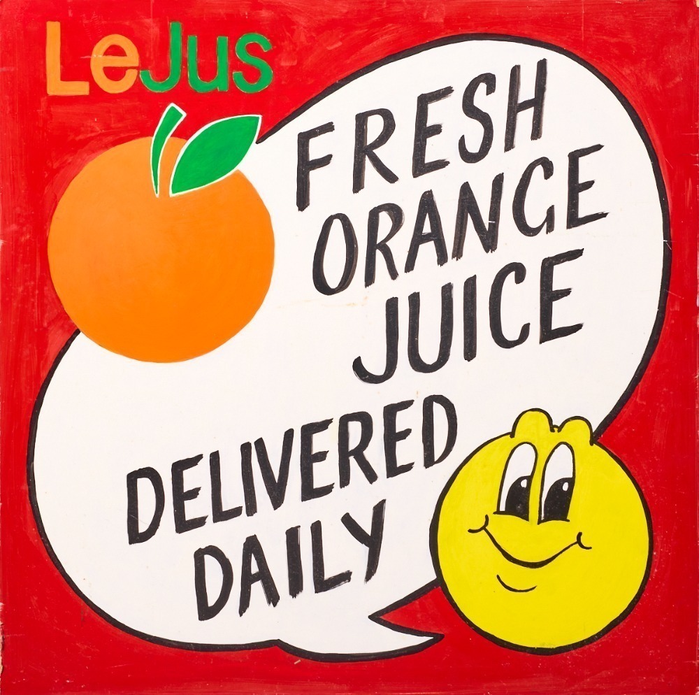 A Vintage Hand Painted Orange Juice Sign